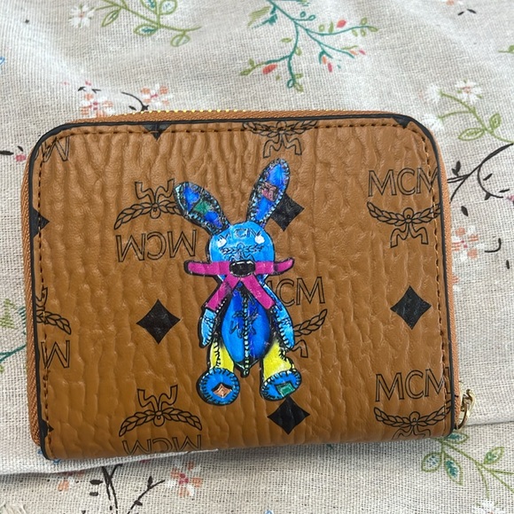 MCM | Bags | Leather Rabbit Mcm Visetos Tan Zip Wallet | Poshmark